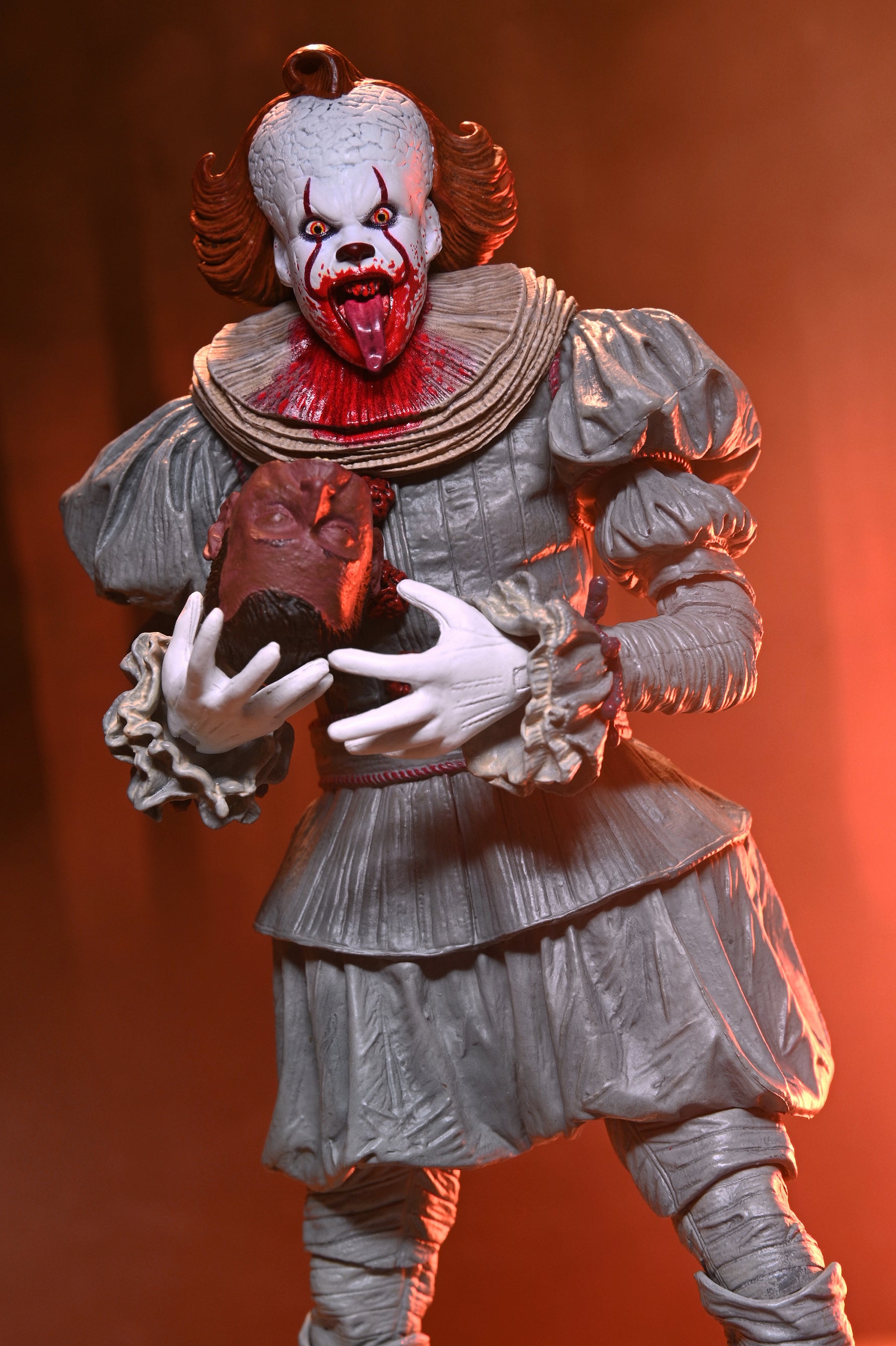 IT: Welcome to Derry - Ultimate Pennywise 7" Scale Action Figure – NECA