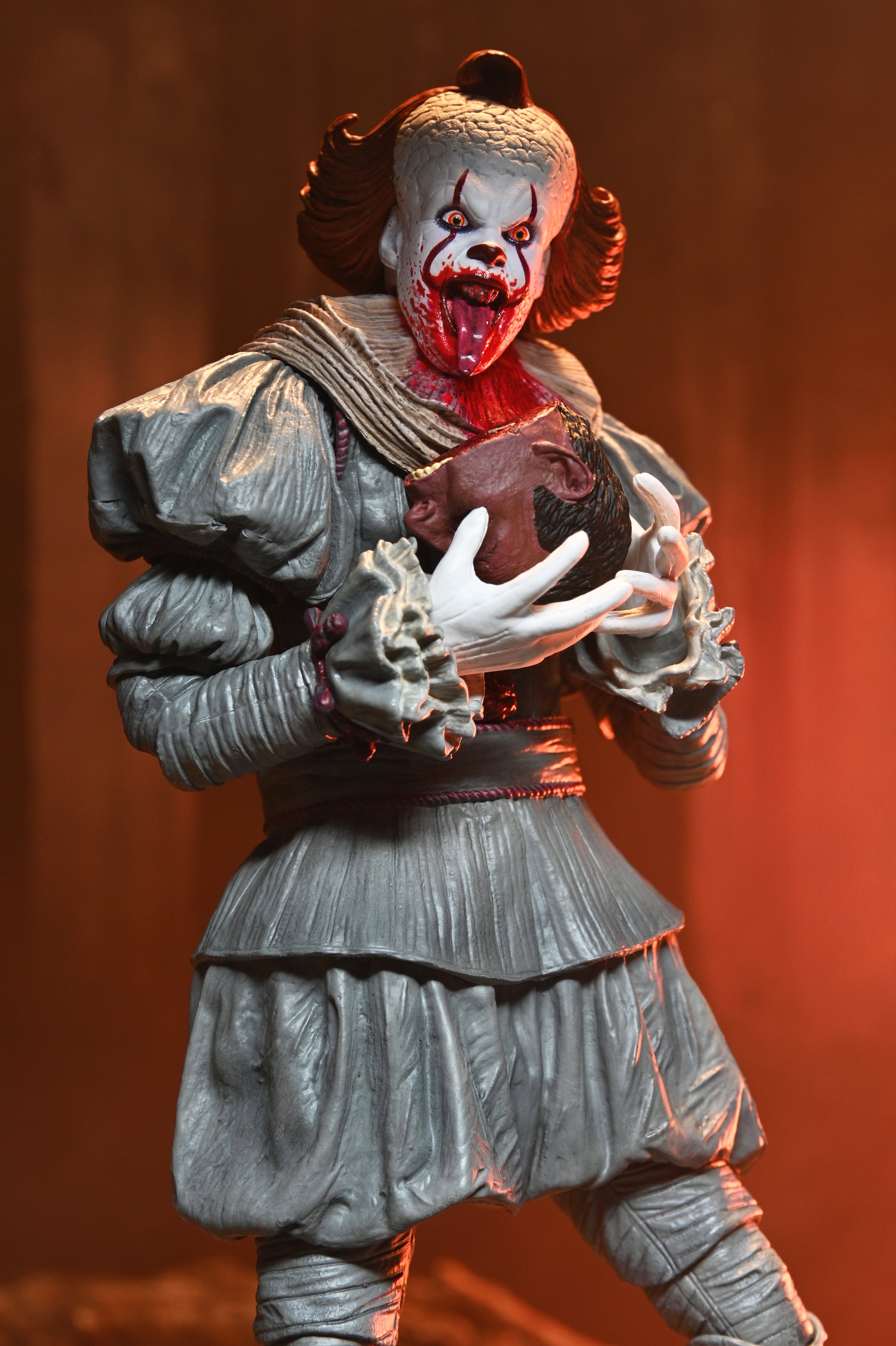 IT: Welcome to Derry - Ultimate Pennywise 7" Scale Action Figure – NECA