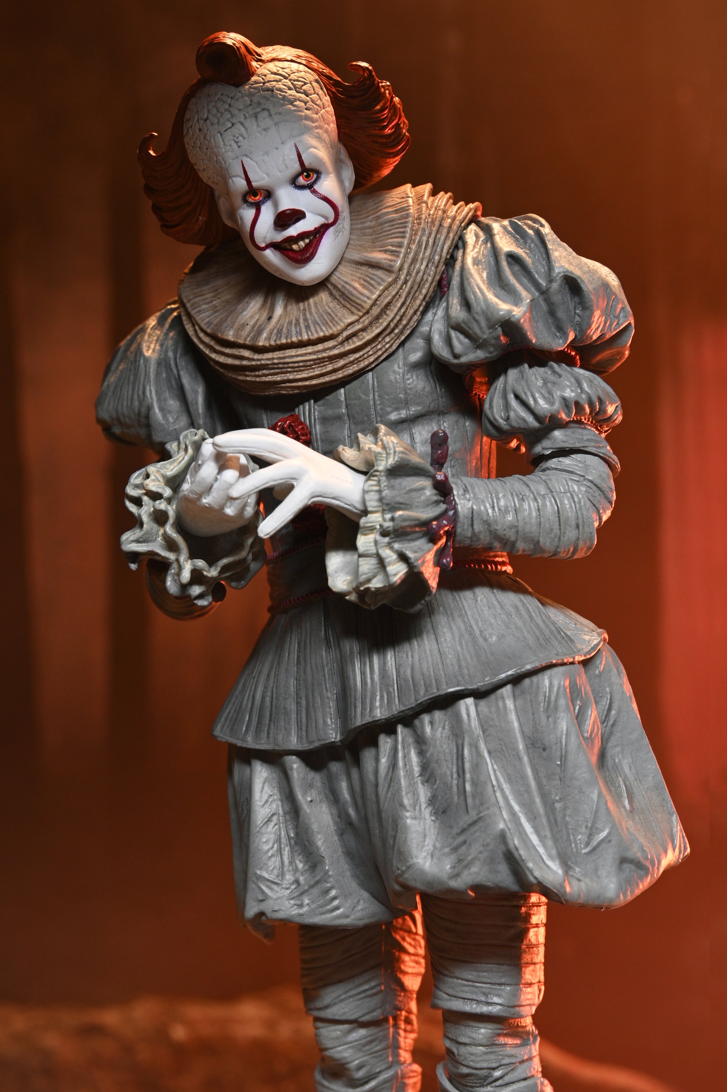 IT: Welcome to Derry - Ultimate Pennywise 7" Scale Action Figure – NECA